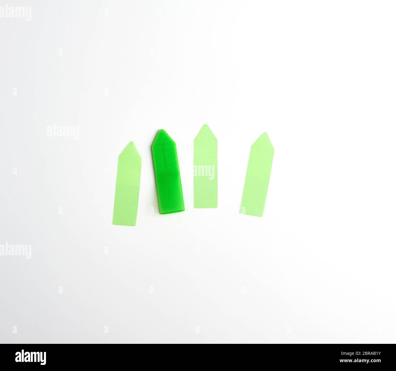 plastic green velcro bookmark for paper on white background, copy space ...