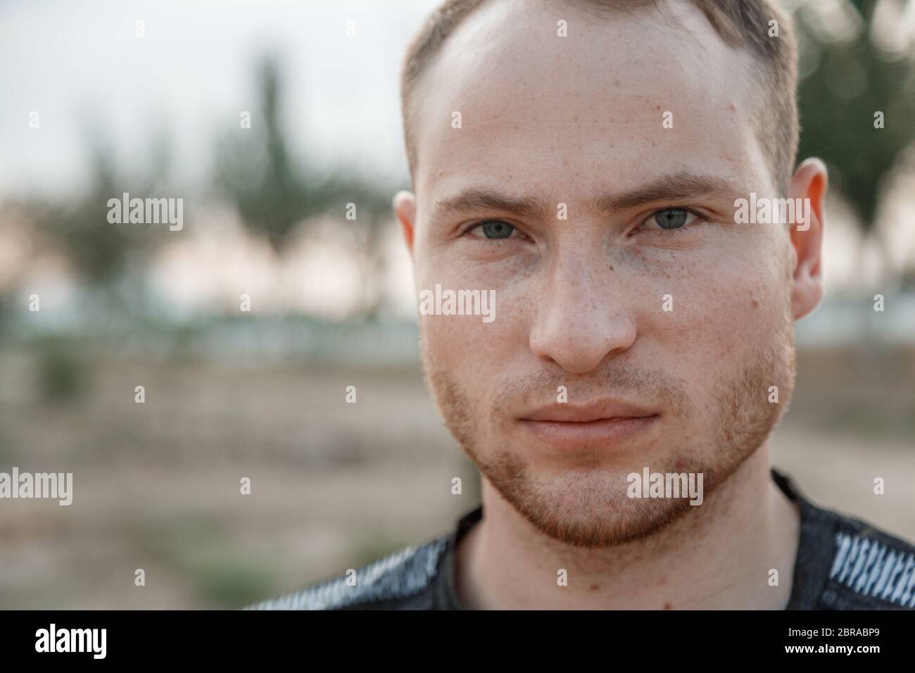 portrait of a sporty young Caucasian guy in a black t-shirt Stock Photo ...