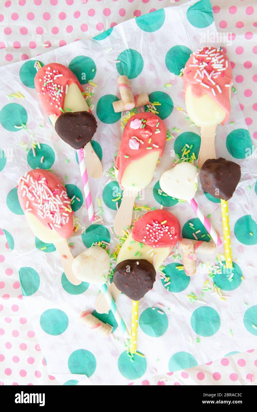 Colorful ice cream popsicles on fun polka dots Stock Photo - Alamy