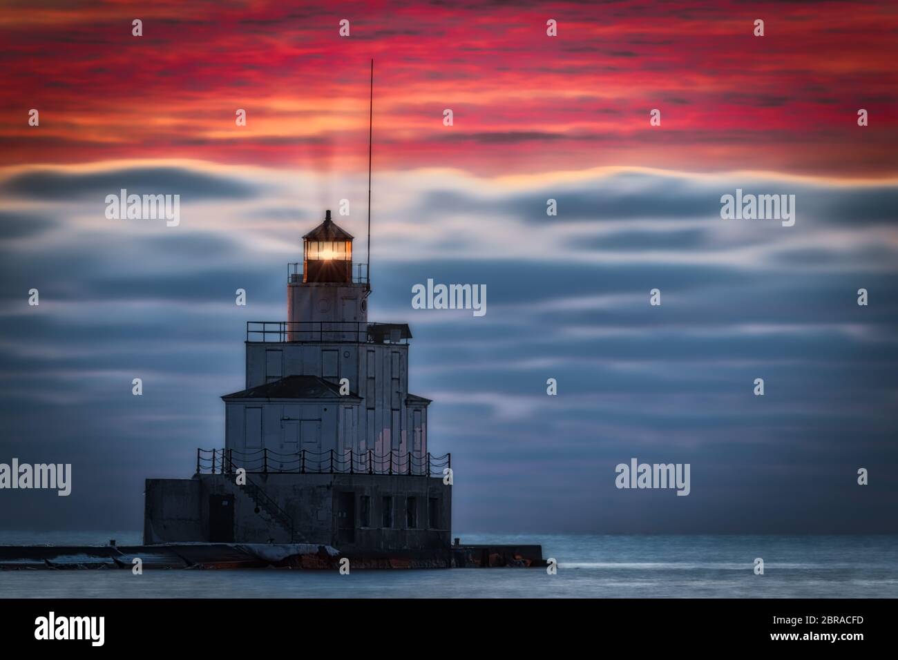 Winter at the north pier and lighthouse in the harbor of Manitowoc ...