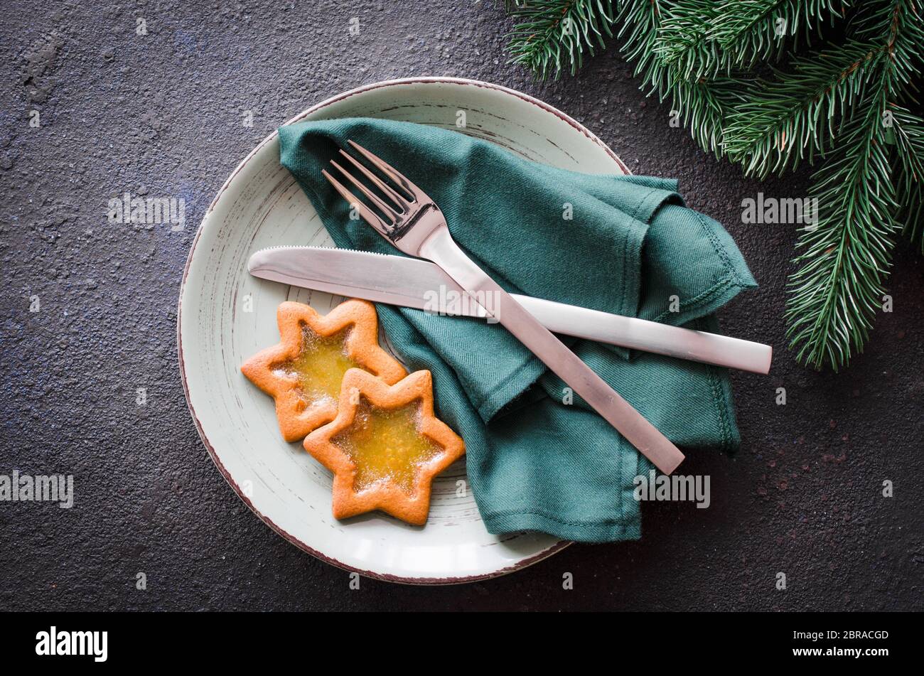Christmas festive table setting with xmas decorations. Selective focus ...