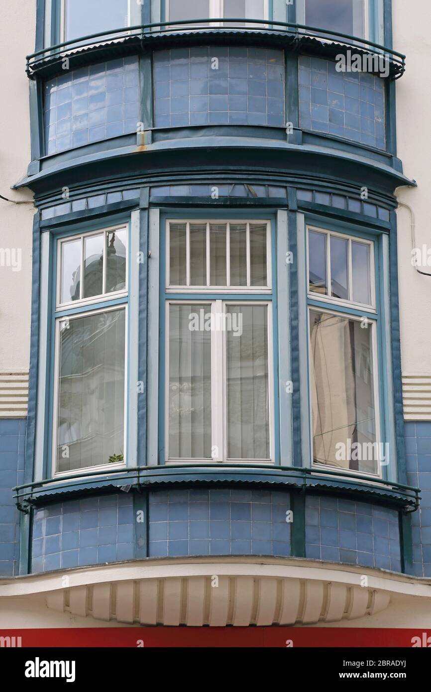 Triple Window at Building Exterior in Ljubljana Stock Photo - Alamy