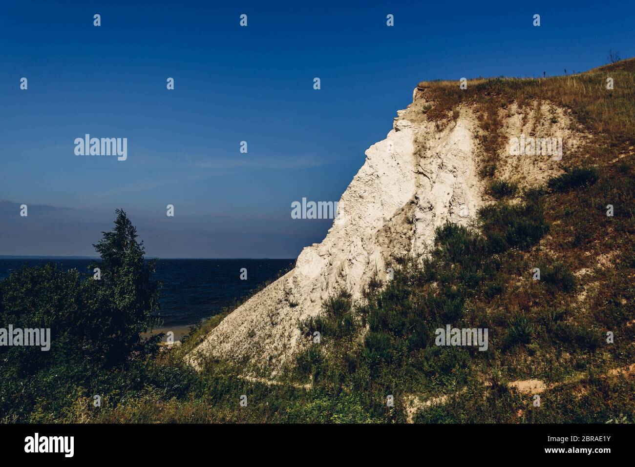 Landscape of a dolomite cliff next to the river Stock Photo - Alamy