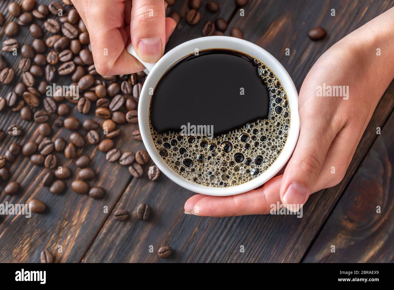 Hands full brazilian coffee hi-res stock photography and images - Alamy