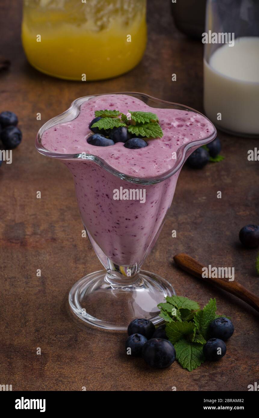 Berries milkshake smoothie, delish with fresh herbs mint Stock Photo ...