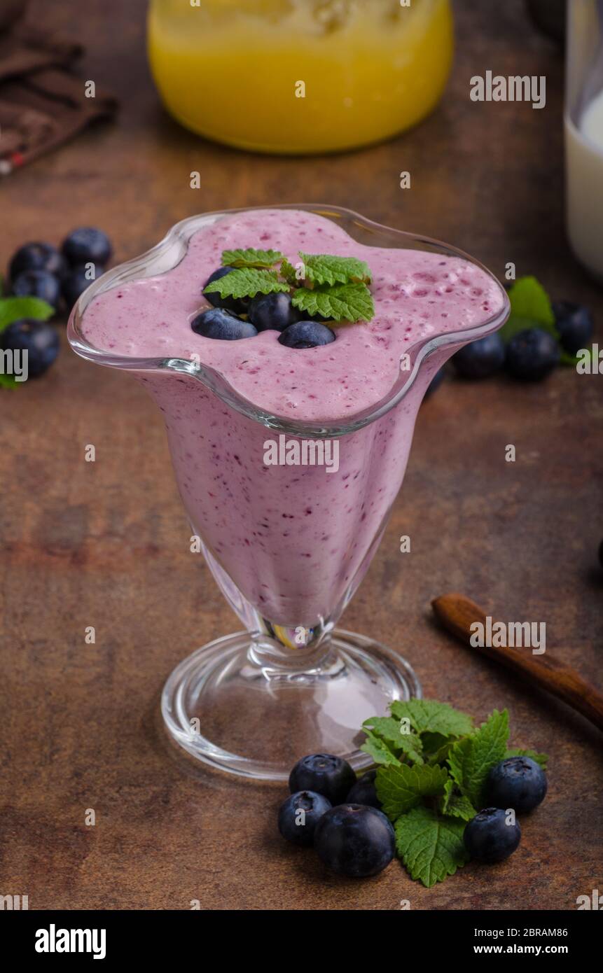 Berries milkshake smoothie, delish with fresh herbs mint Stock Photo ...