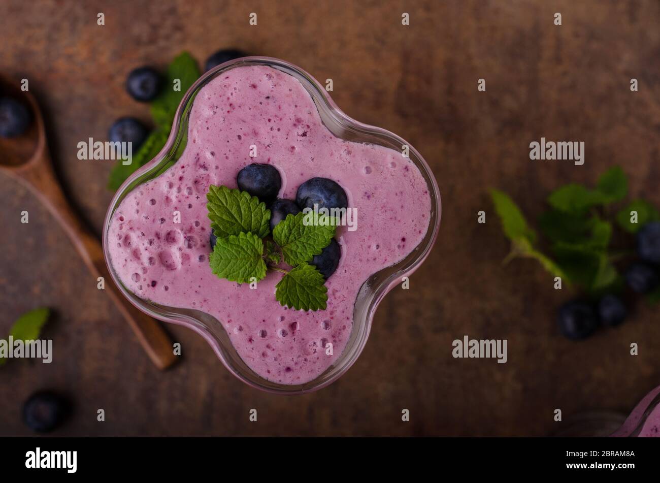 Berries milkshake smoothie, delish with fresh herbs mint Stock Photo ...