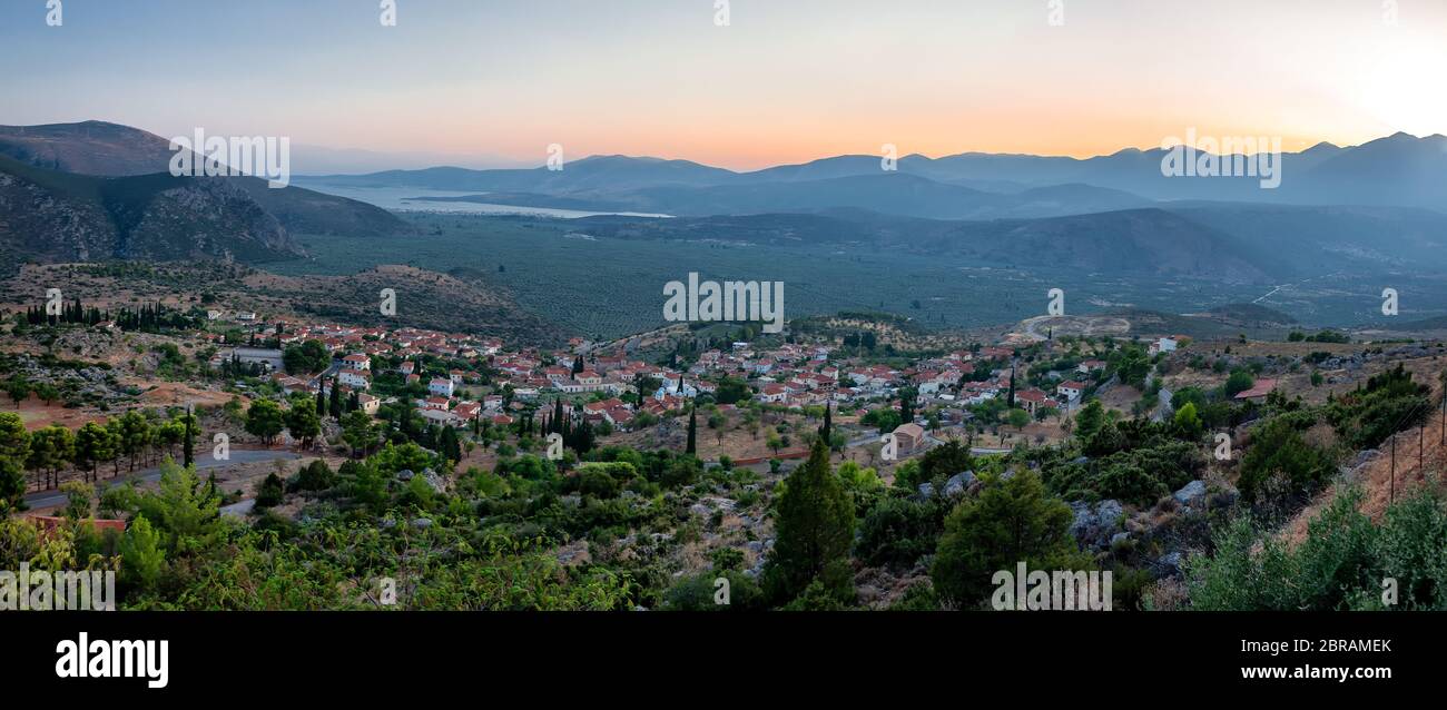 View over Distomo at sunset Stock Photo - Alamy