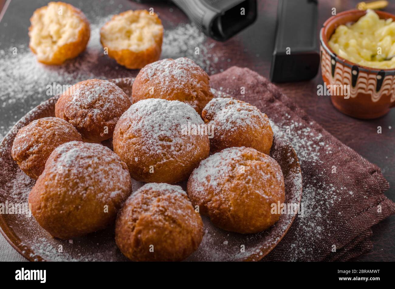 Homemade donuts with sugar and gun, american policeman morning Stock ...