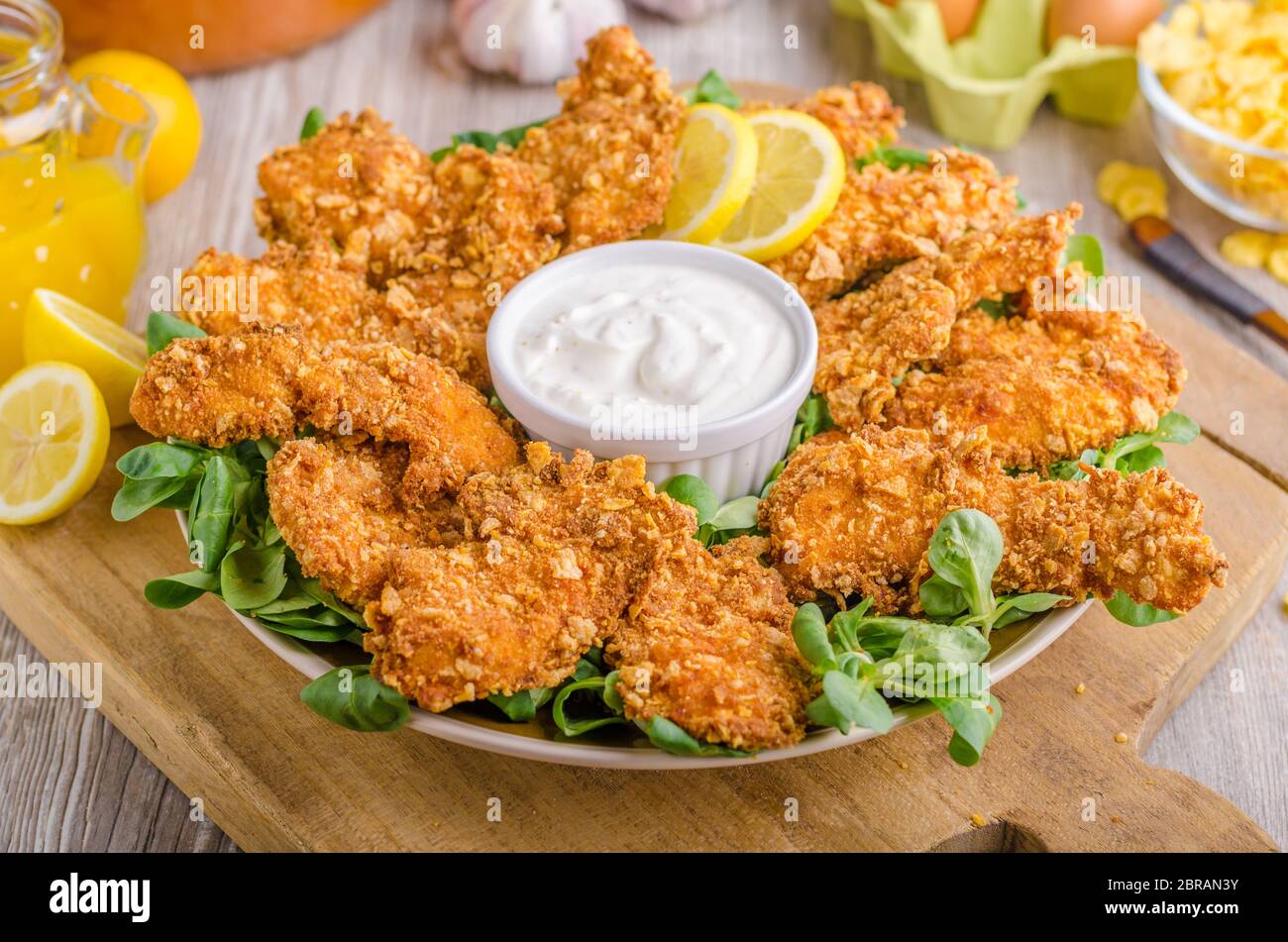 Chicken strips with delish garlic dip, food photography Stock Photo - Alamy