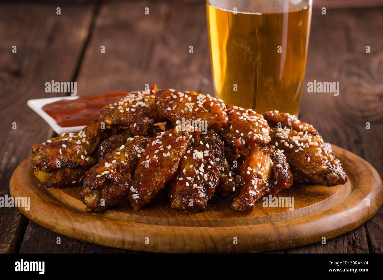 Grilled chicken wings with hot sauce. food photography, ready for ...