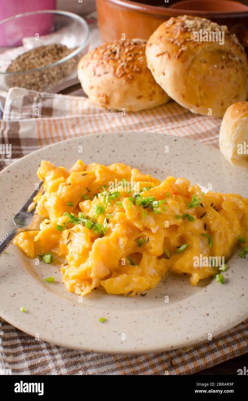 Scrambled eggs with buns, herbs inside, fast and delicious breakfast ...