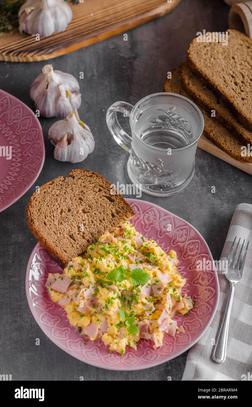 Scrambled eggs, wholegrain bread with fresh microgreens on top Stock ...