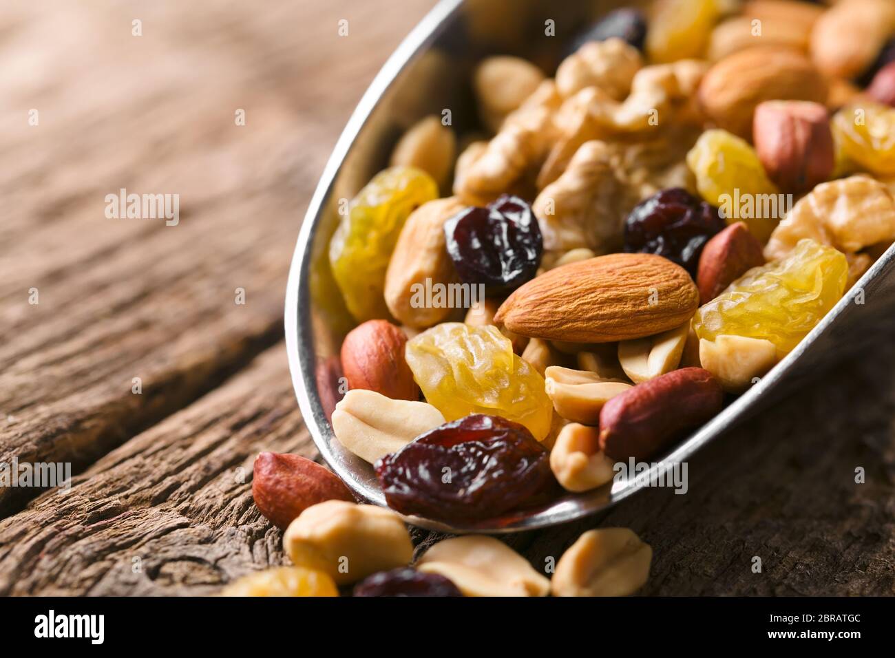 Healthy trail mix snack made of nuts (walnut, almond, peanut) and dried ...