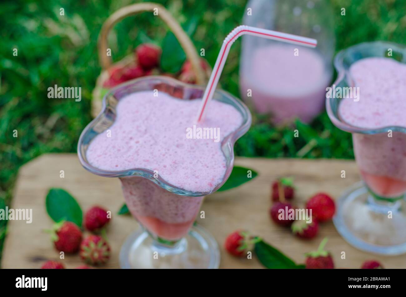 Strawberrie smoothie outside summer, basket with strawberries Stock ...