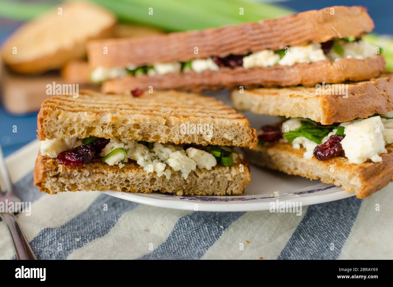 Sandwich with blue cheese and cranberries, baked in panini grill Stock ...