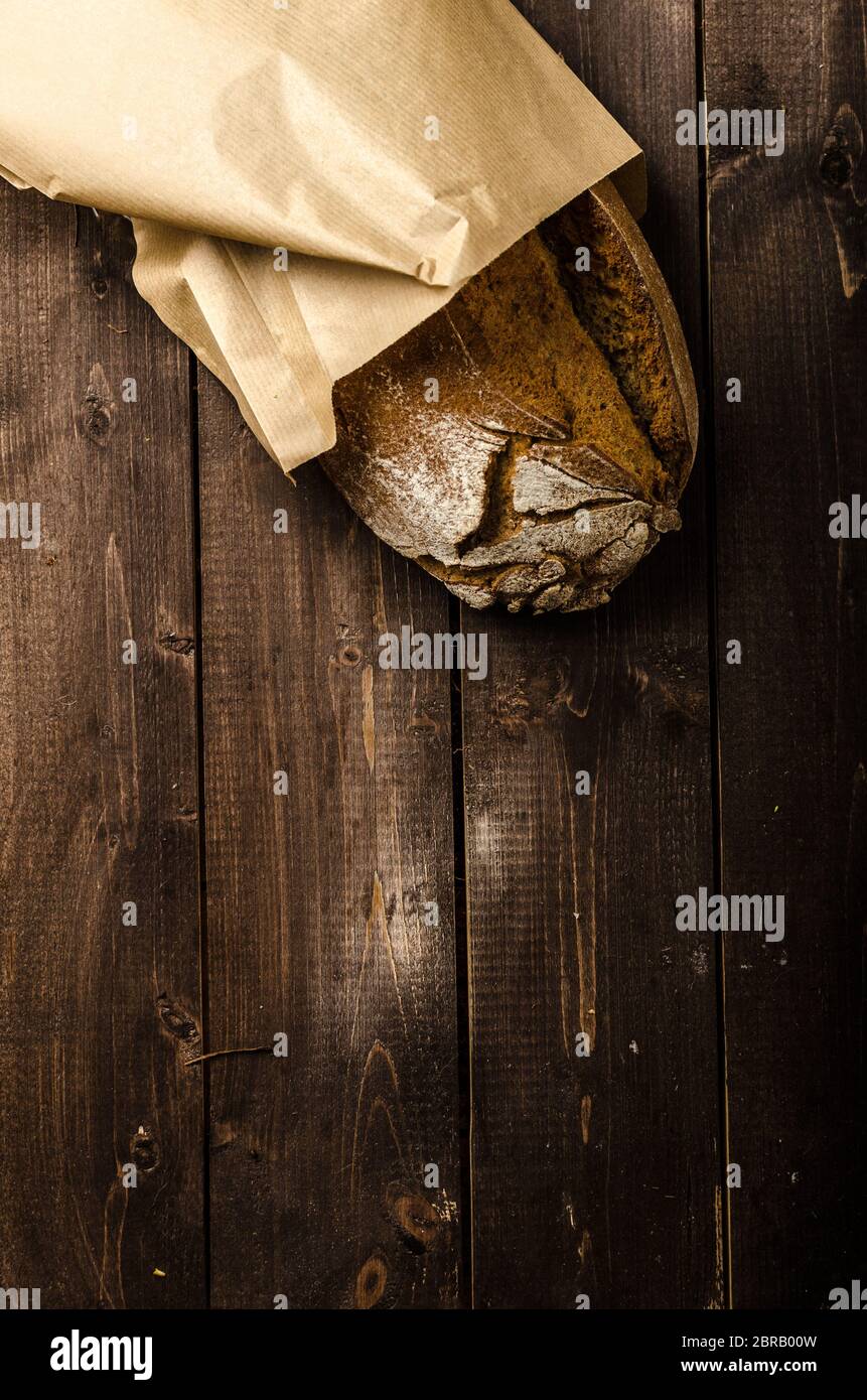 Homemade bread, place for your advertisement, dark picture Stock Photo ...