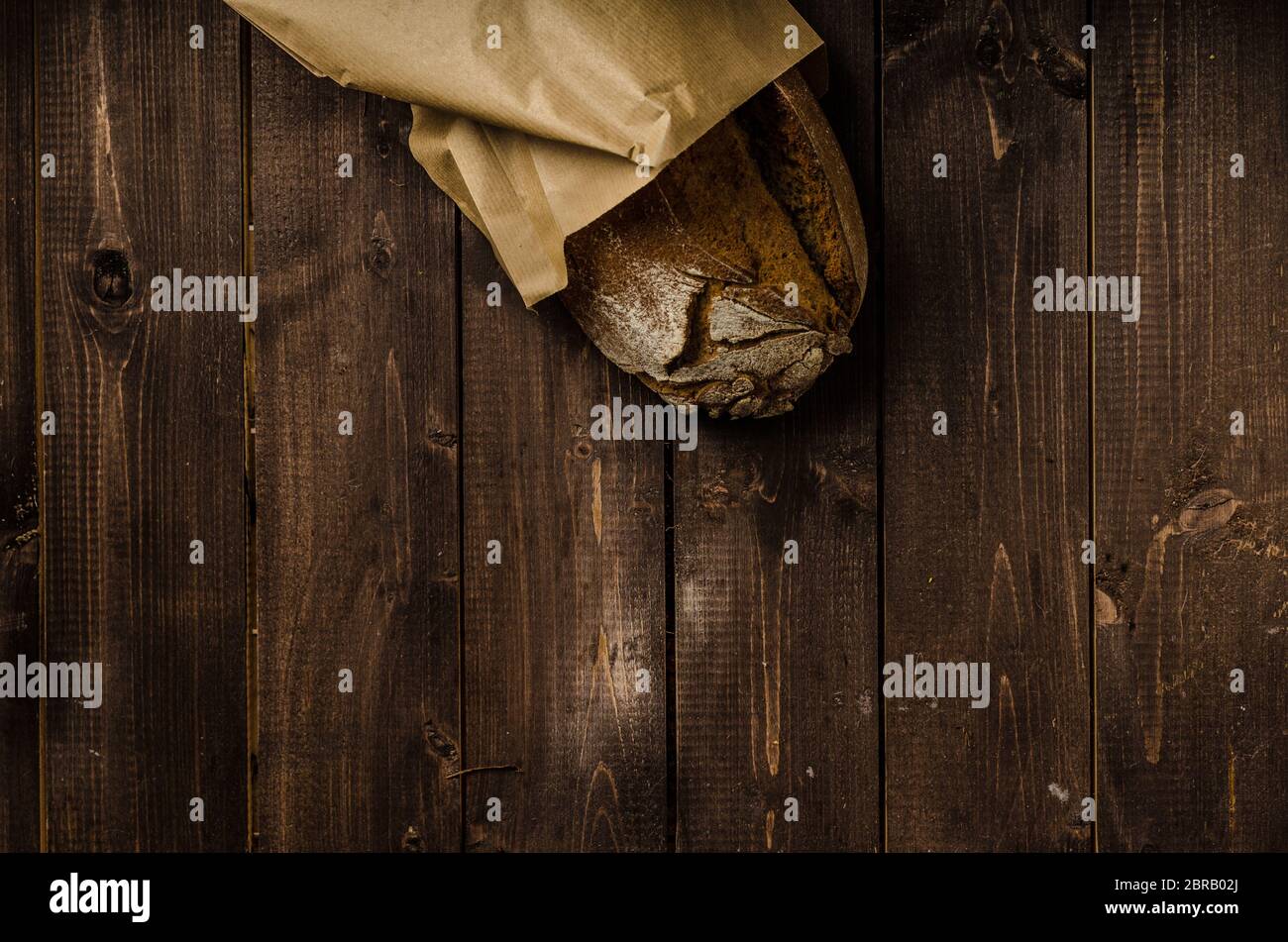 Homemade bread, place for your advertisement, dark picture Stock Photo ...