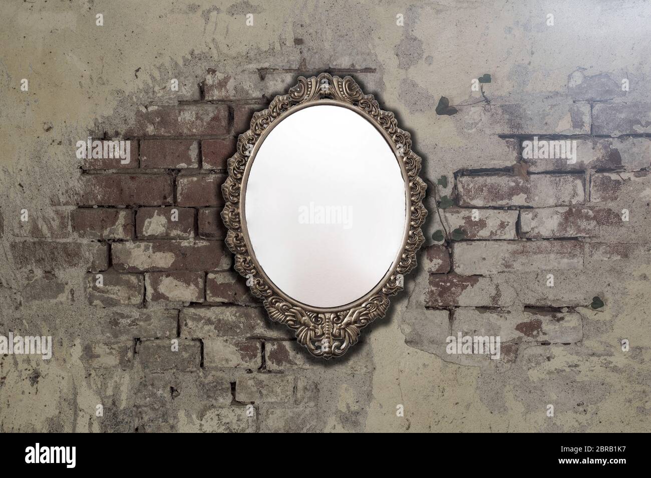 Vintage antique mirror on old brick wall background texture, space for ...