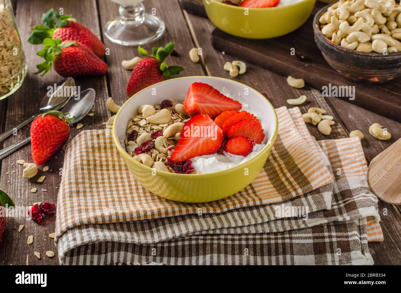 oatmeal with yogurt, fresh strawberries and nuts, healthy breakfast full of vitamins Stock Photo ...
