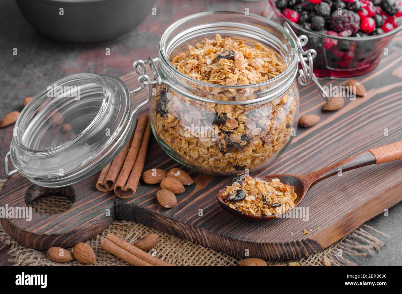 Baked granola with berries, delish simple meal Stock Photo - Alamy