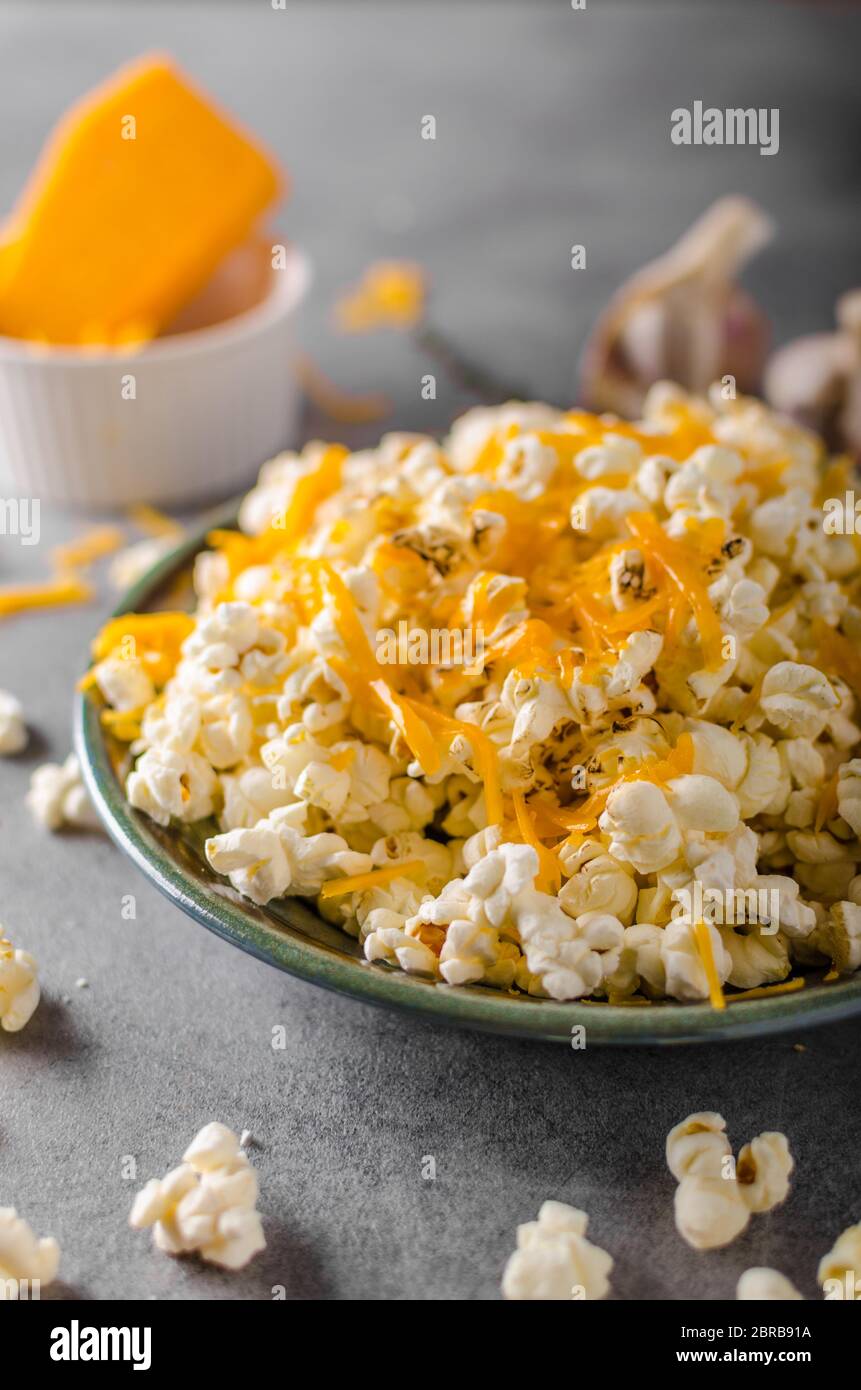 Homemade cheese popcorn with garlic, herbs and cheddar cheese Stock ...