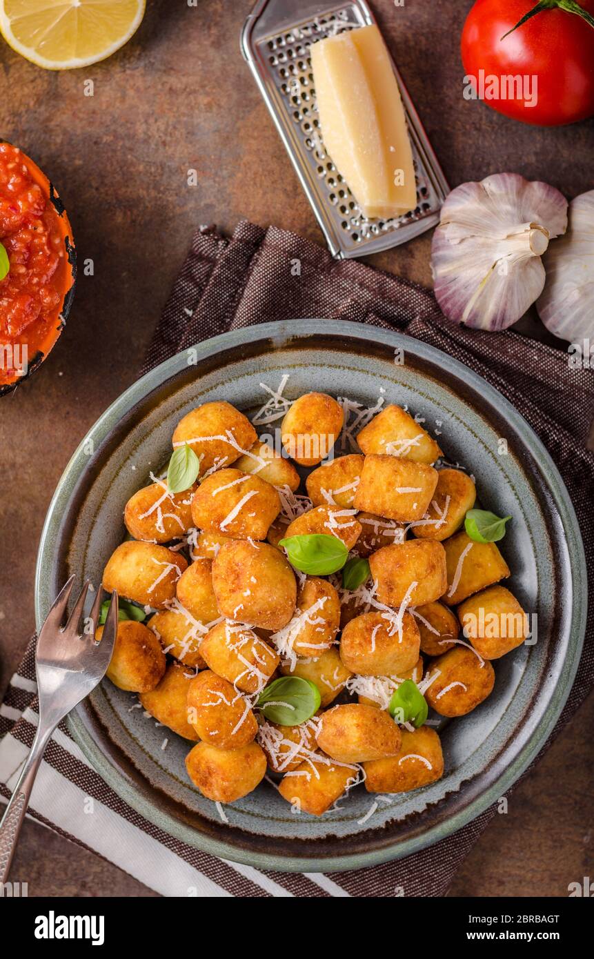 Golden fried mini croquette with parmesan cheese, delicious with tomato ...