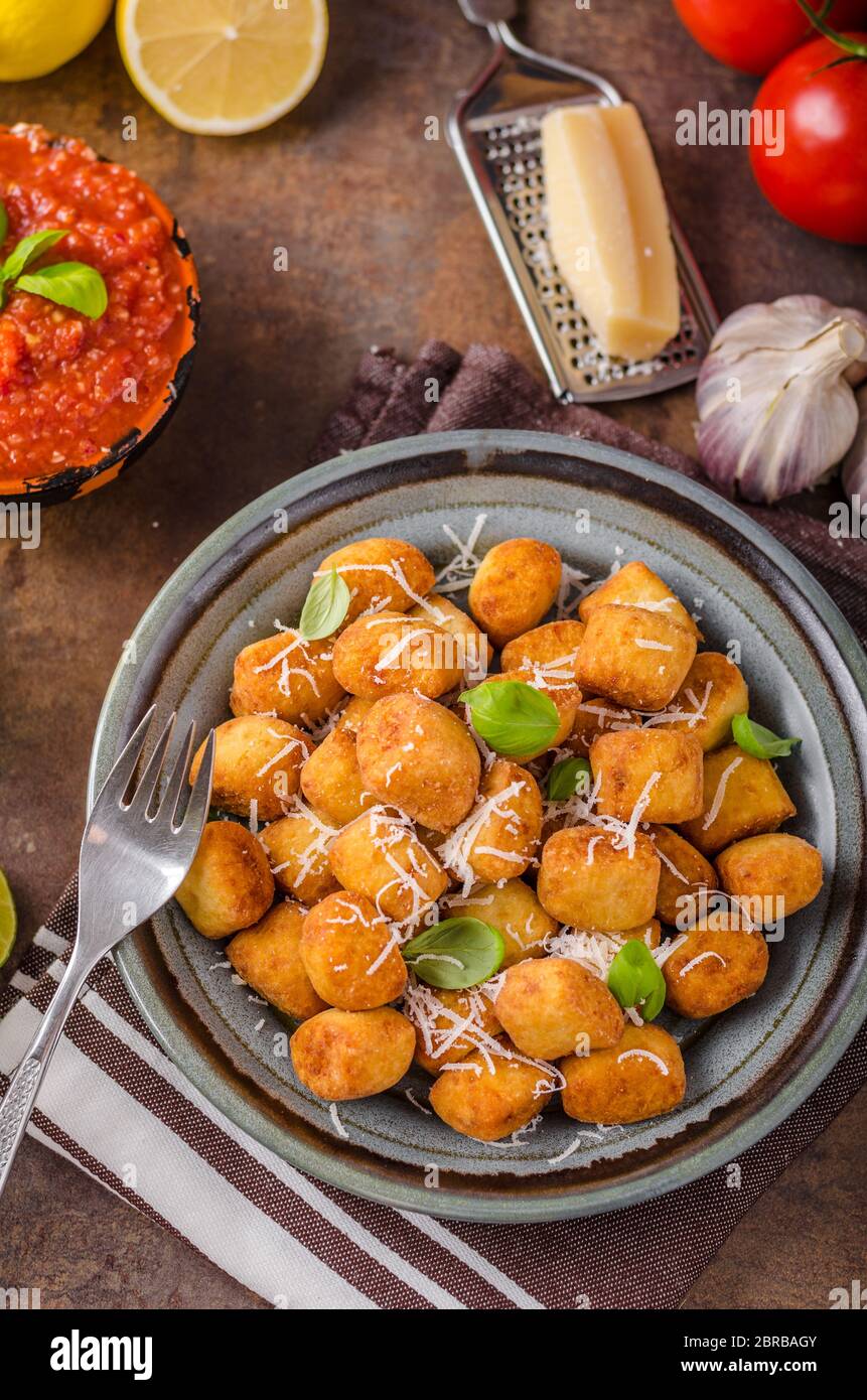 Golden fried mini croquette with parmesan cheese, delicious with tomato ...