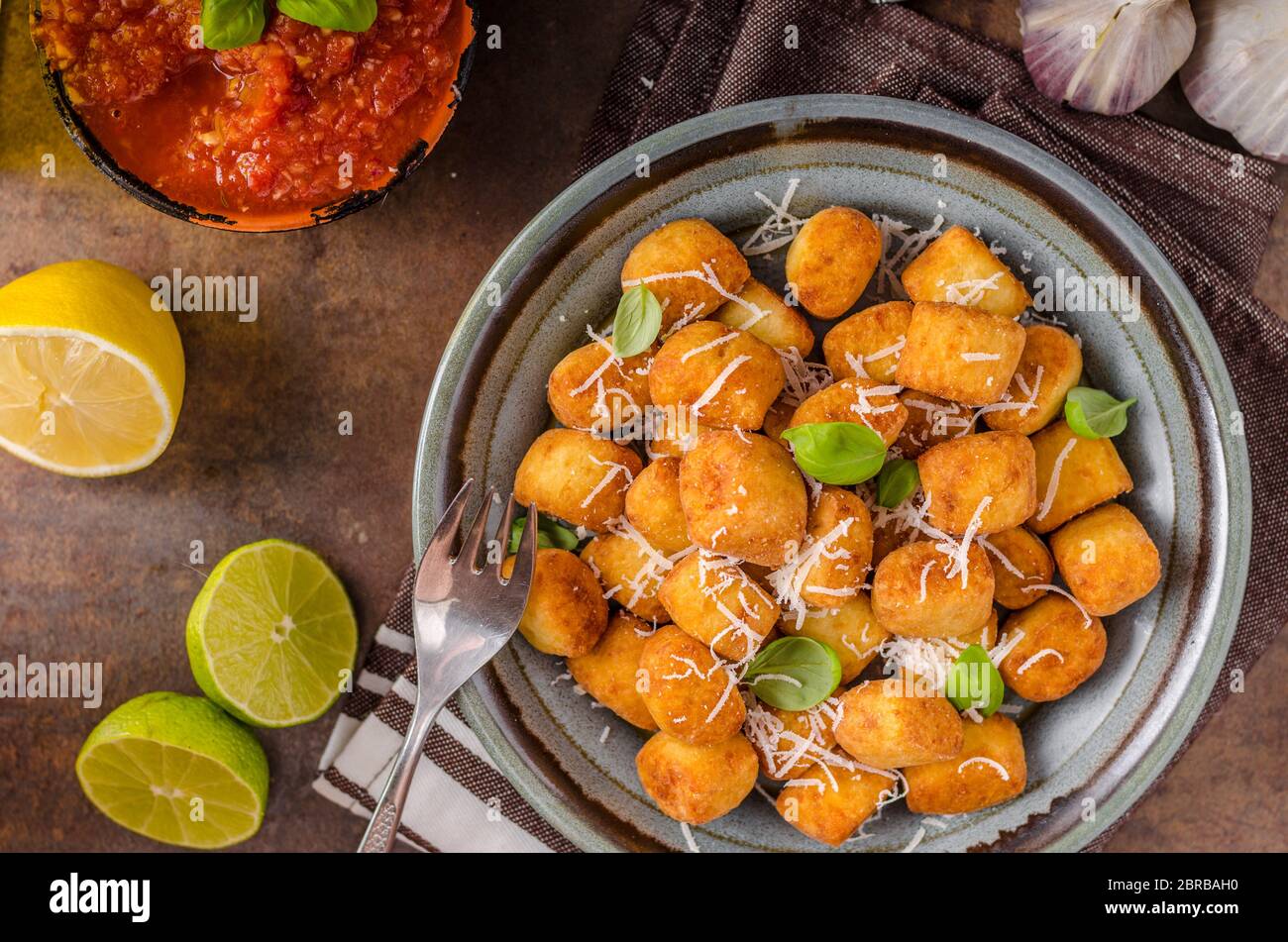 Golden fried mini croquette with parmesan cheese, delicious with tomato ...