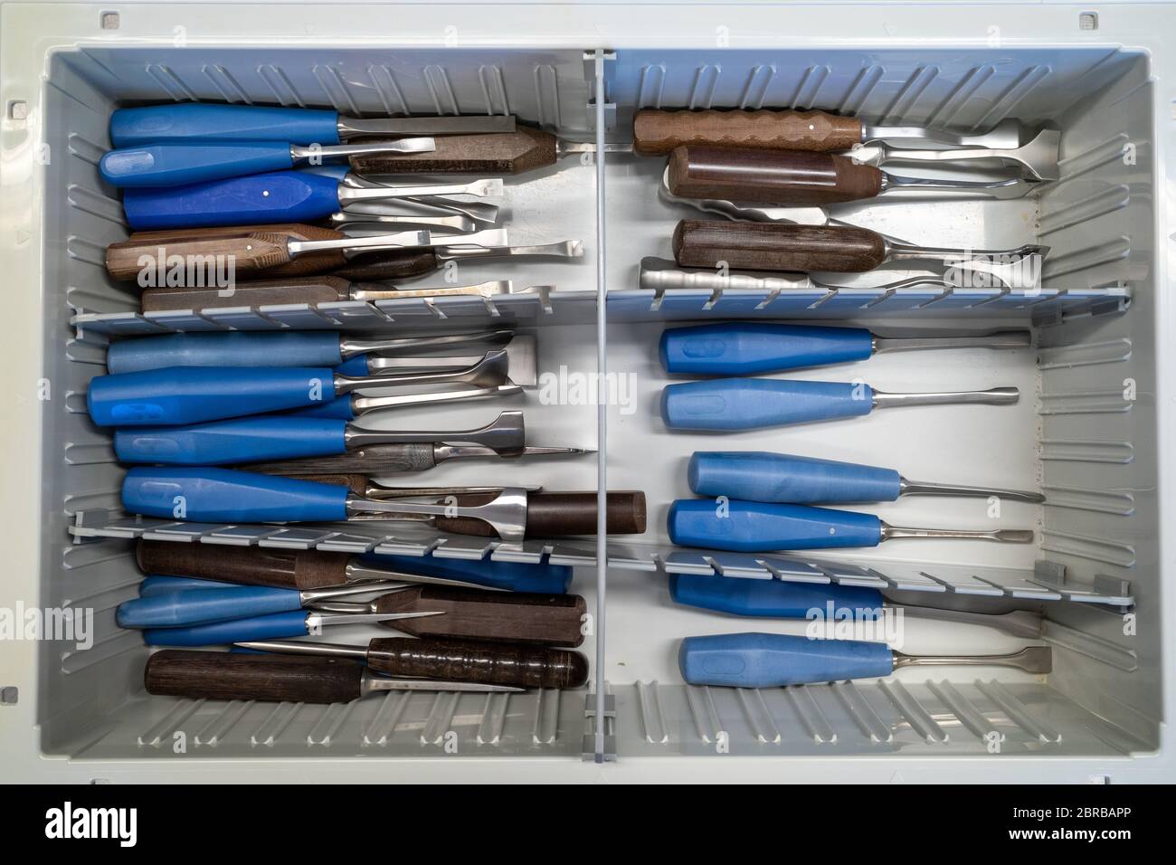 different surgical chisels lie side by side in one drawer Stock Photo ...