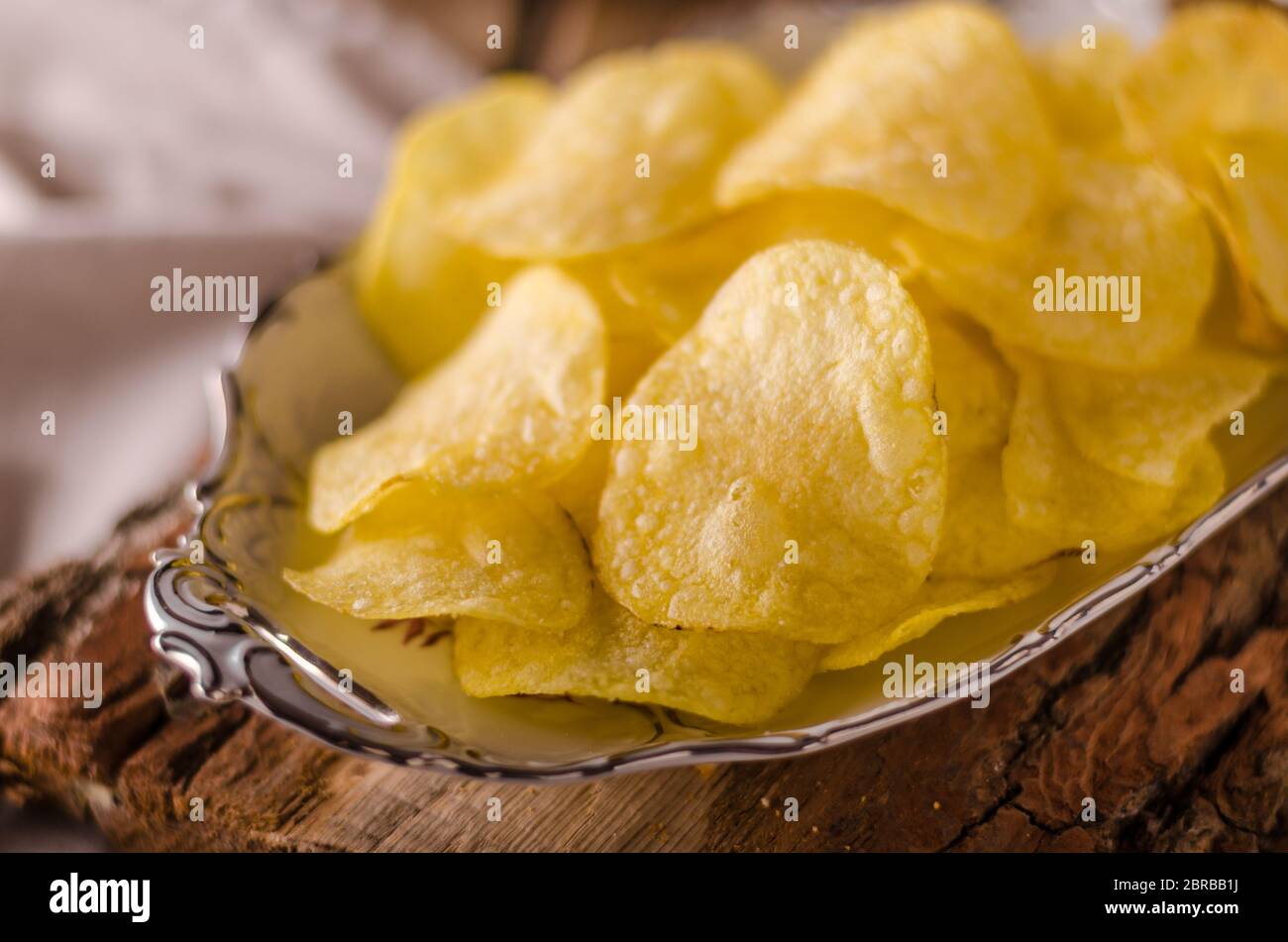 Potato chips product photography, homemade chips delish Stock Photo - Alamy