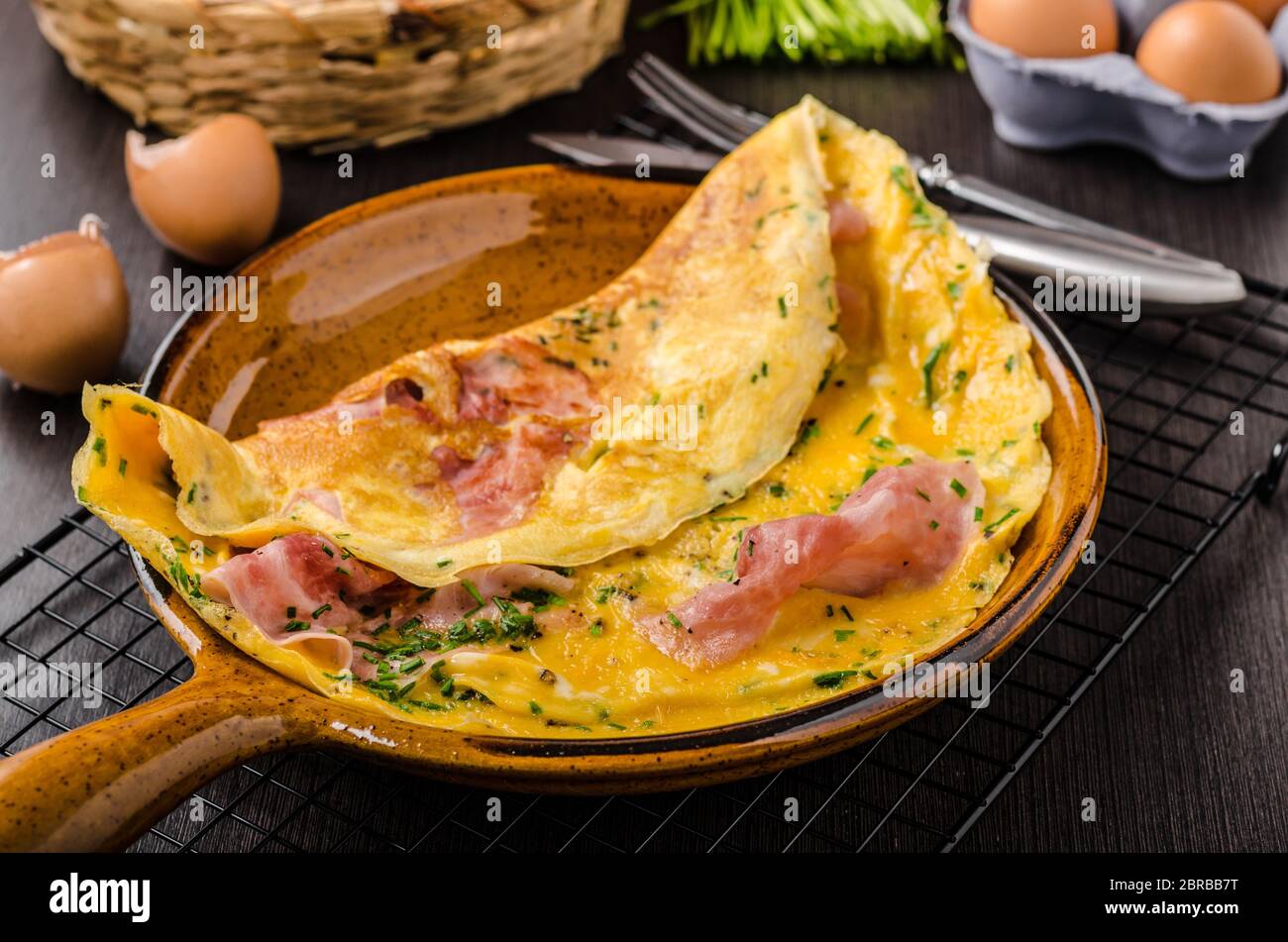 Ham and egg omelette, delicious and simple with fresh bread and herbs ...