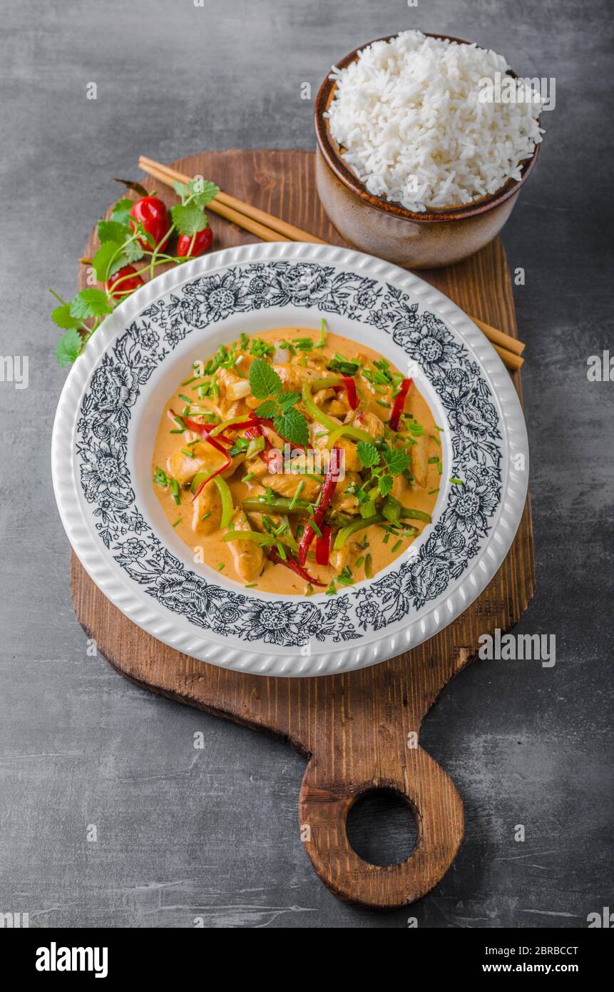 Chicken curry delish food, with rice and herbs Stock Photo - Alamy