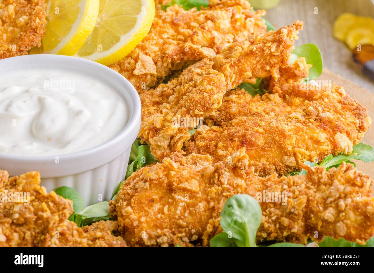 Chicken strips with delish garlic dip, food photography Stock Photo - Alamy