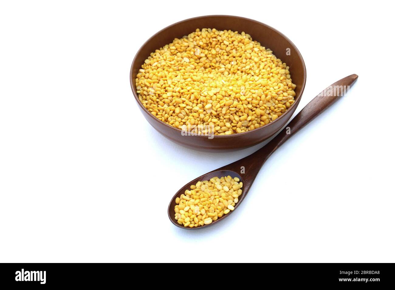 Peeled split soy beans in bowl and spoon on white background Stock ...