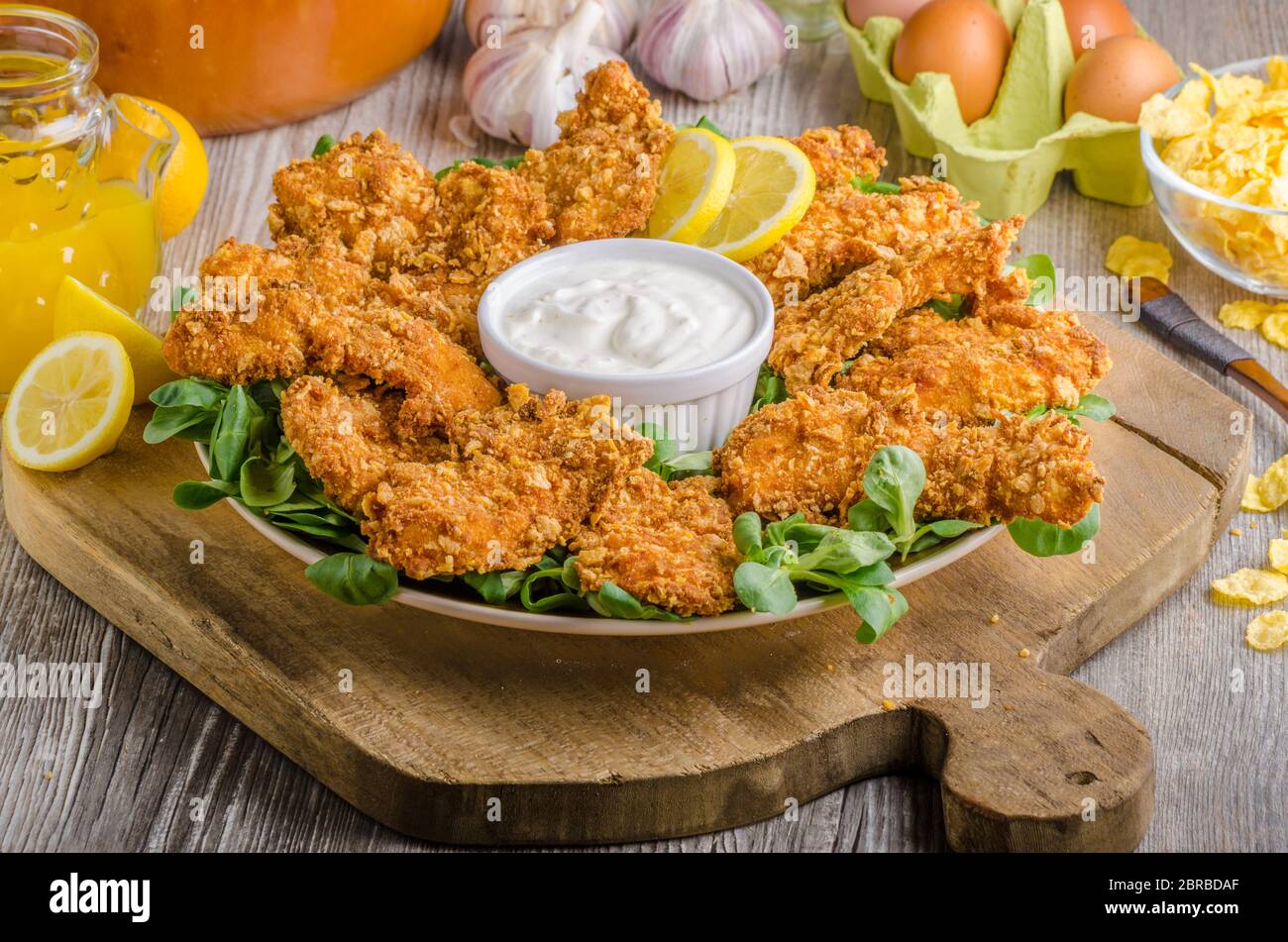 Chicken strips with delish garlic dip, food photography Stock Photo - Alamy