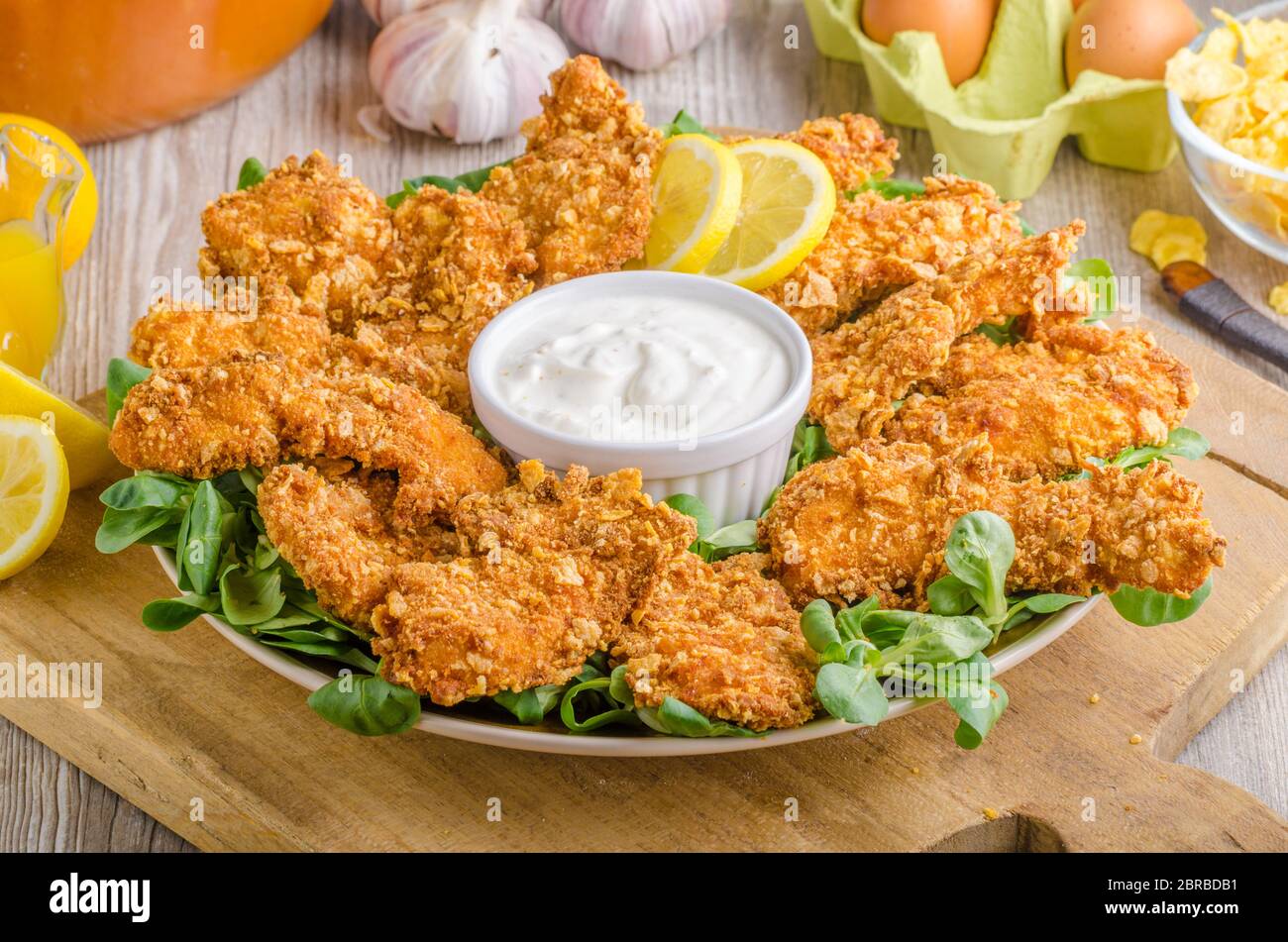 Chicken strips with delish garlic dip, food photography Stock Photo - Alamy