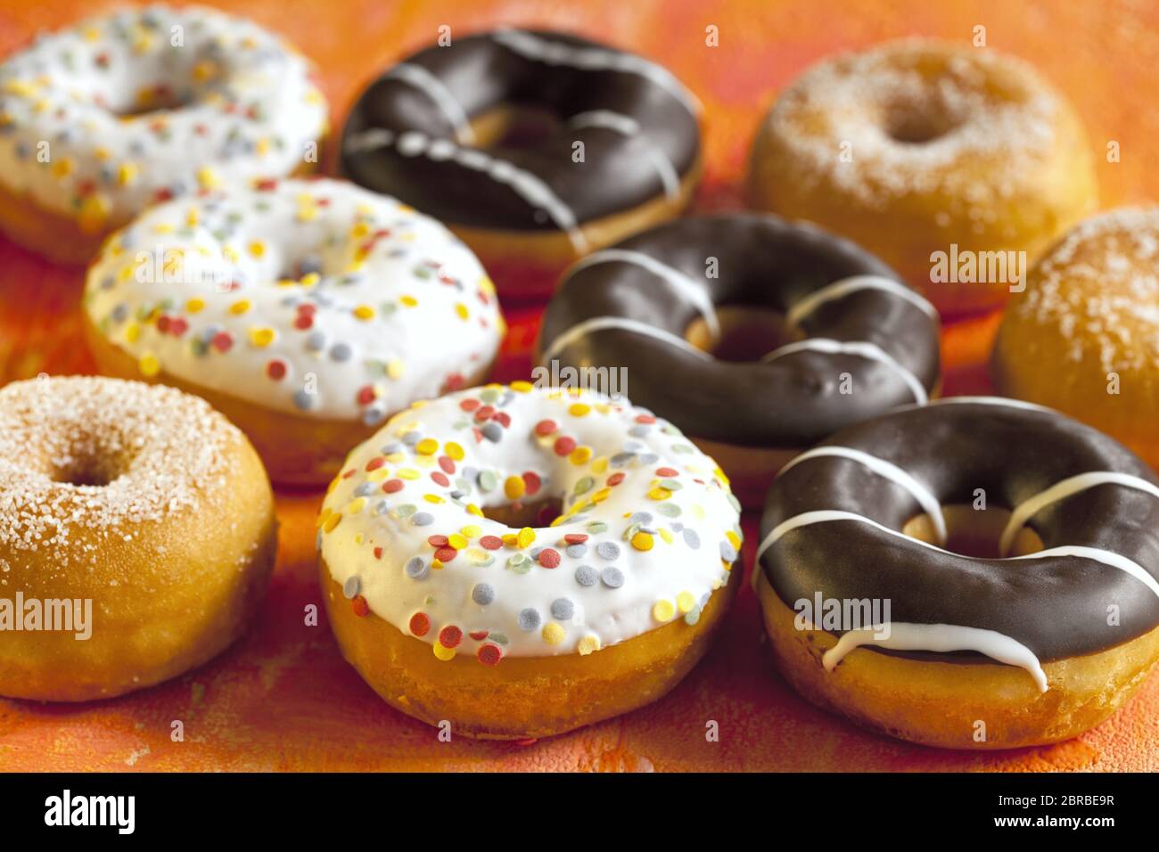 selection of sweet treat donuts with differnt topics Stock Photo - Alamy