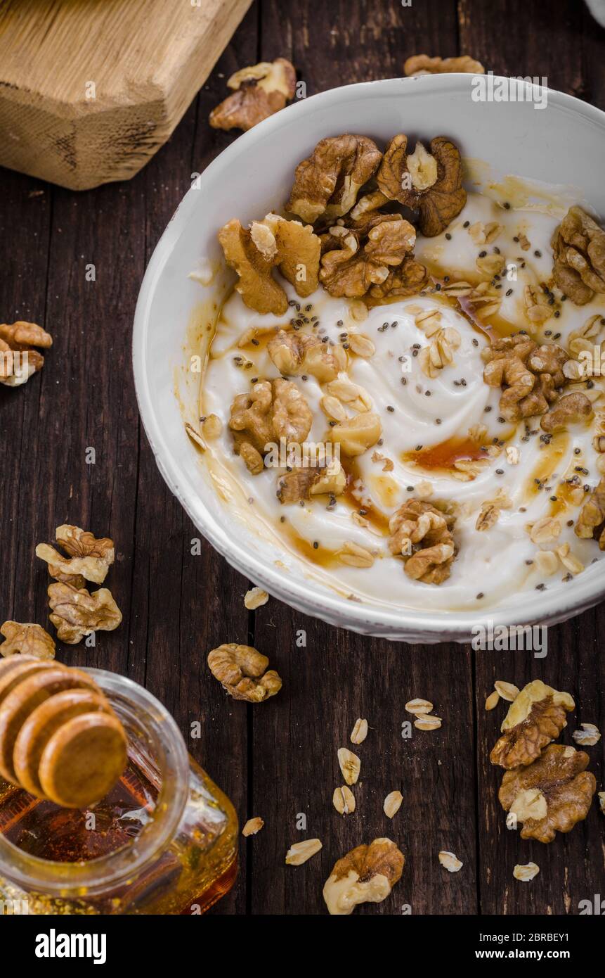 Fresh cheese with honey and walnuts, food photography, food stylind ...