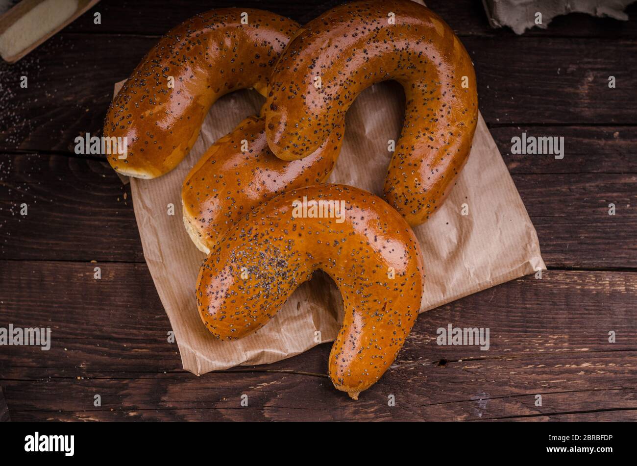 Poppy seeds roll pastry, other pastries behind, food photography Stock ...