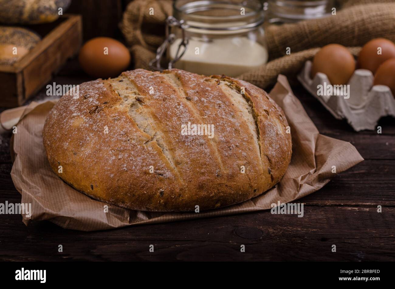 Homemade bread, product photo, selective focus, others pastries behind ...
