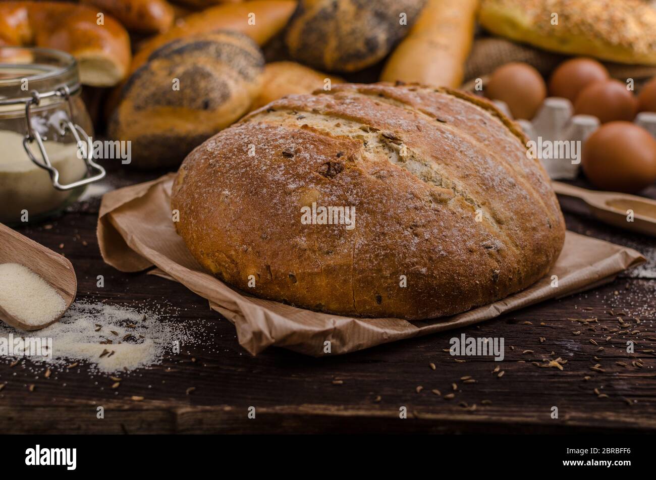 Homemade bread, product photo, selective focus, others pastries behind ...