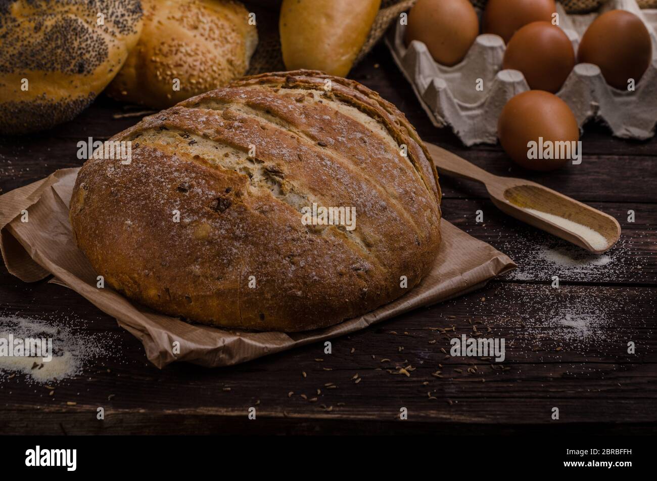 Homemade bread, product photo, selective focus, others pastries behind ...