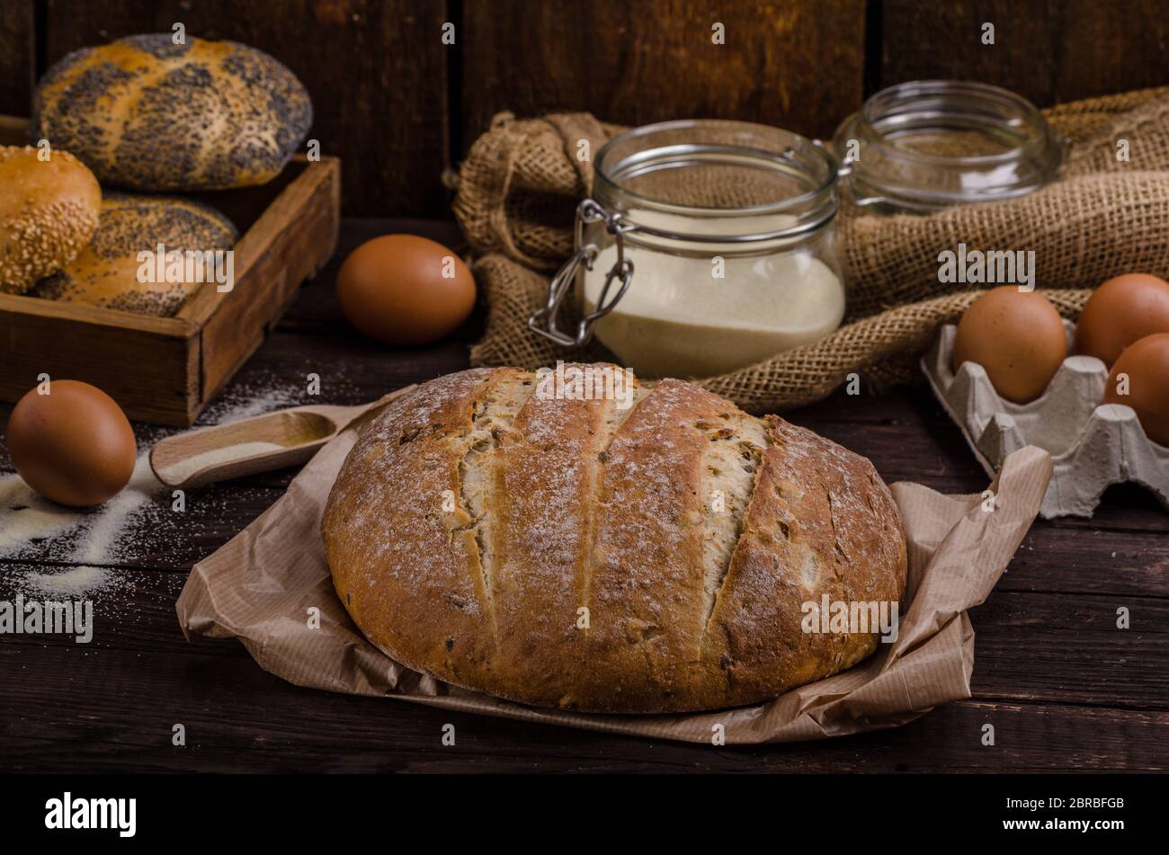 Homemade bread, product photo, selective focus, others pastries behind ...