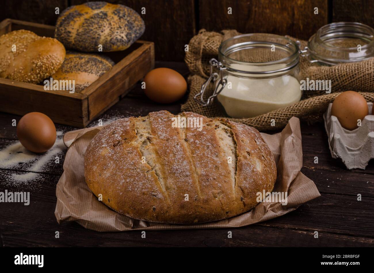 Homemade bread, product photo, selective focus, others pastries behind ...