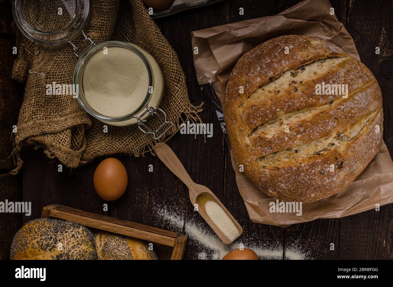 Homemade bread, product photo, selective focus, others pastries behind ...