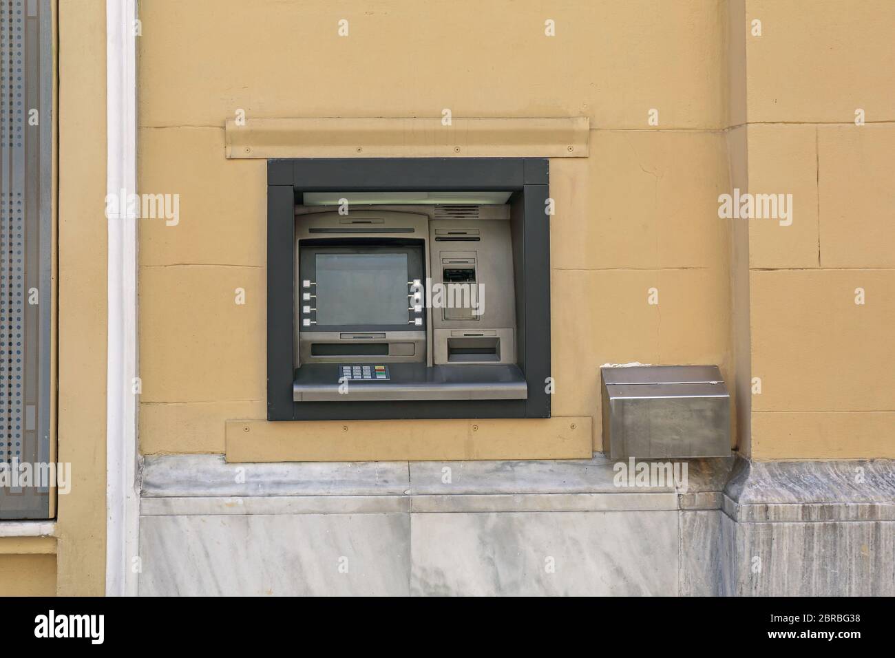 Automated Teller Machine at Bank Exterior Wall Stock Photo - Alamy