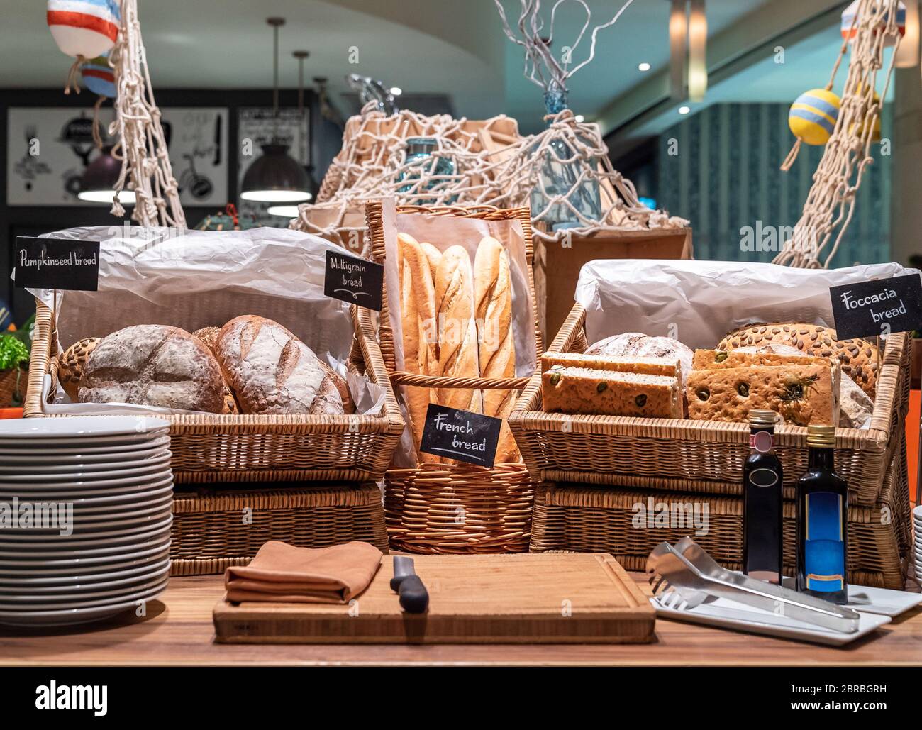 variety of bakery bread and rolls station in buffet line Stock Photo ...