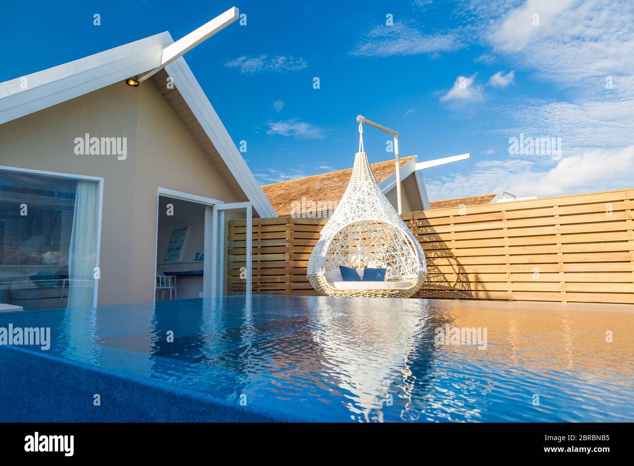 Beautiful poolside and sunset sky. Luxurious tropical beach landscape ...