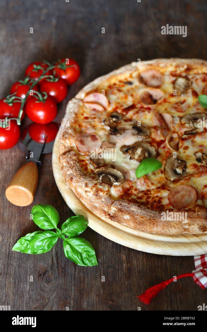 homemade pizza with ham and mushrooms Stock Photo - Alamy